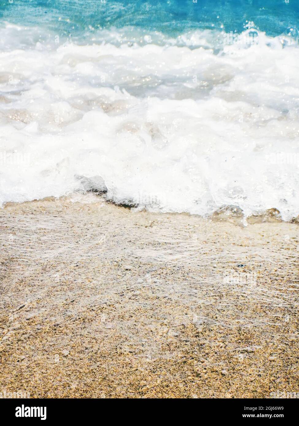Wave of blue ocean on sandy beach Summer Background Stock Photo - Alamy