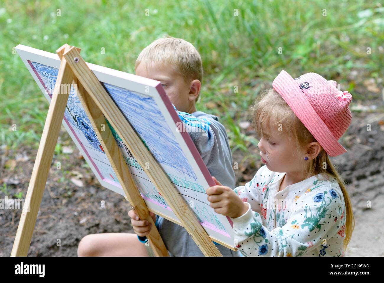 Children draw chalk on a blackboard Stock Photo - Alamy
