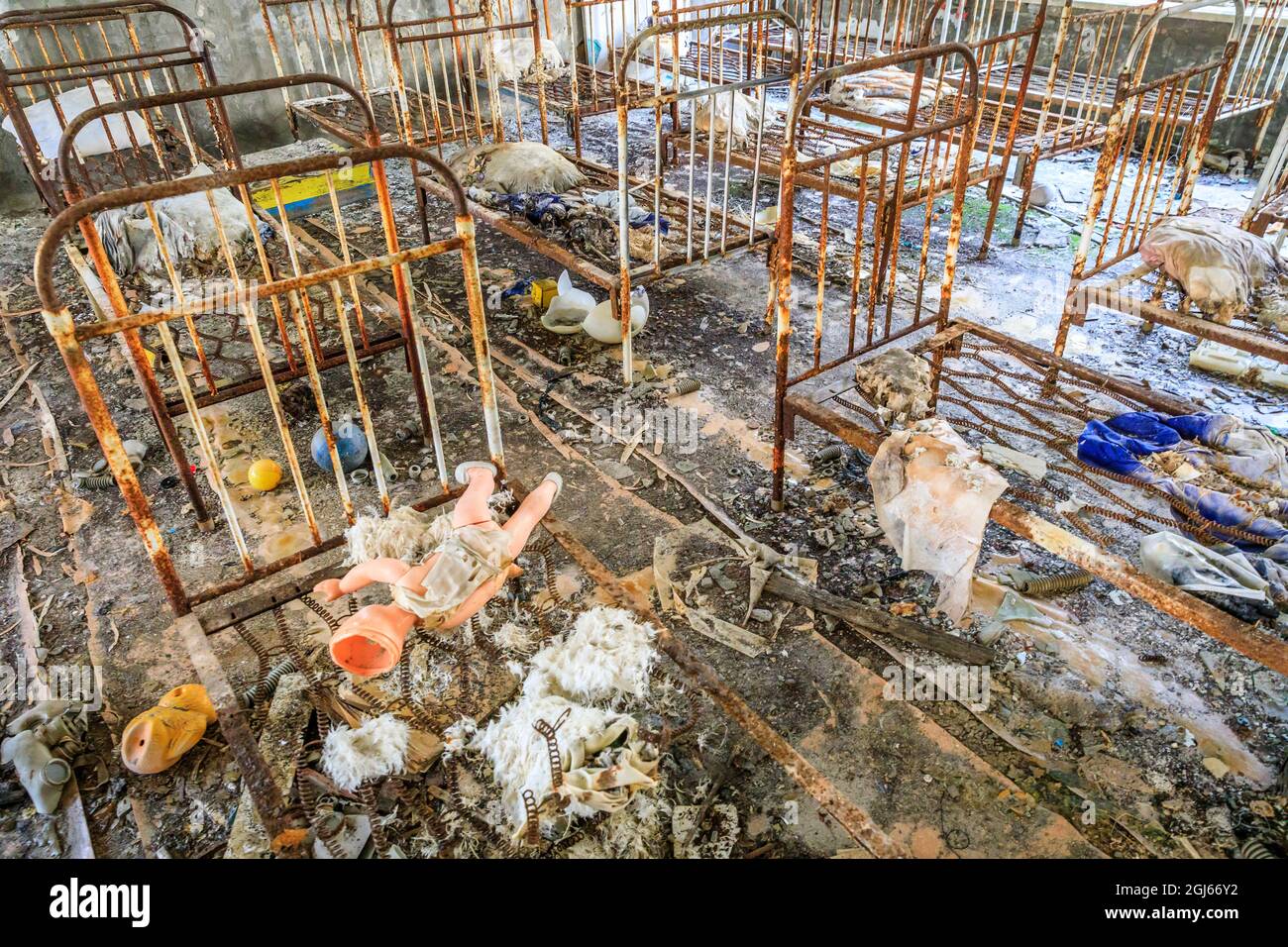 Ukraine, Pripyat, Chernobyl. Toys and beds in the dormitory of the ...