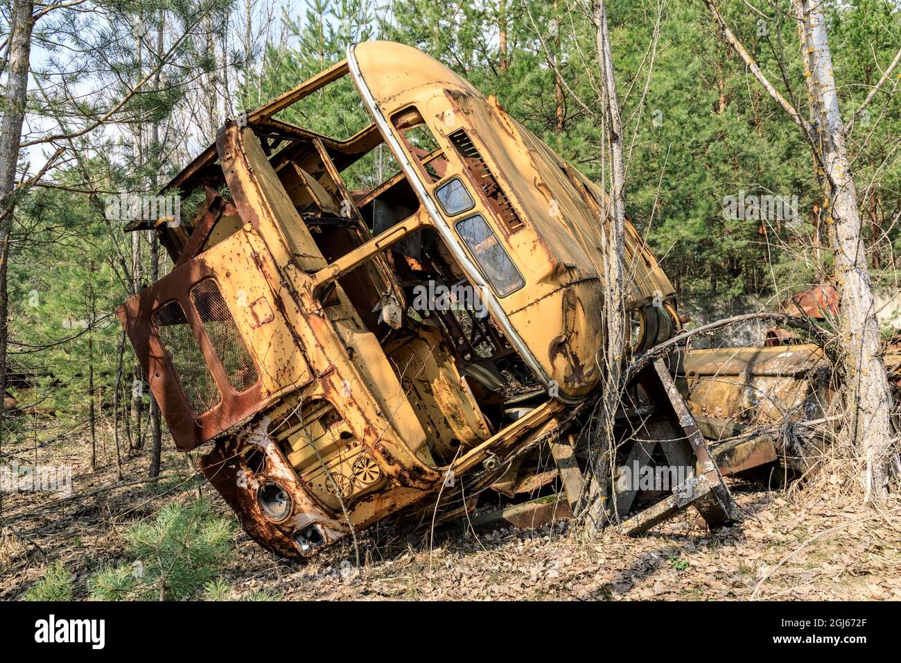 Ukraine, Pripyat, Chernobyl. Rusted overturned school bus Stock Photo ...