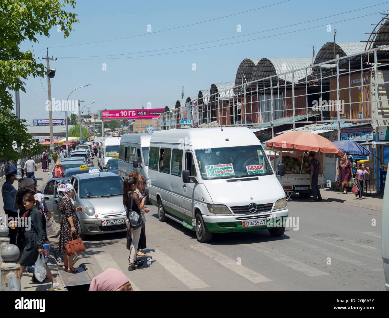 Street life and traffic. City Osh in the Fergana Valley close to the ...