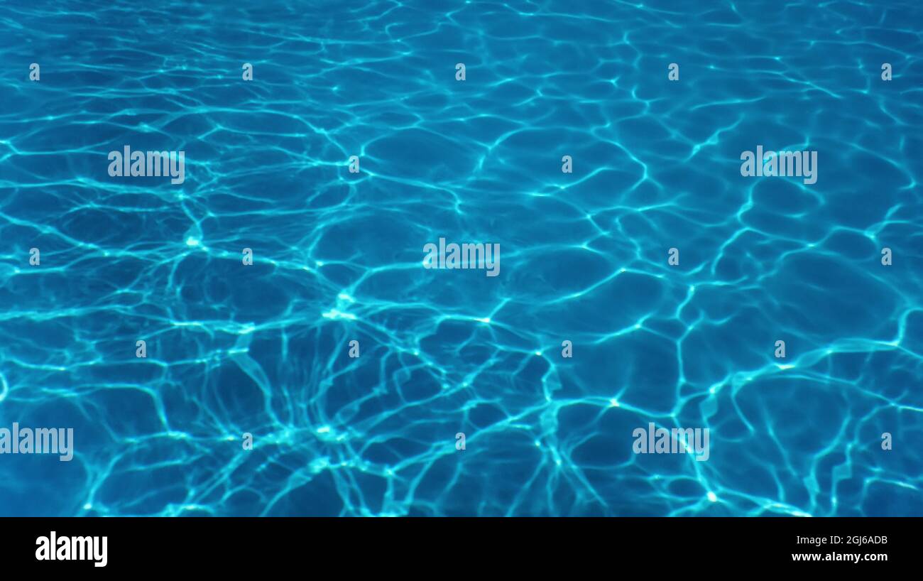 Swimming pool water sun reflection background. Ripple Water Stock Photo ...