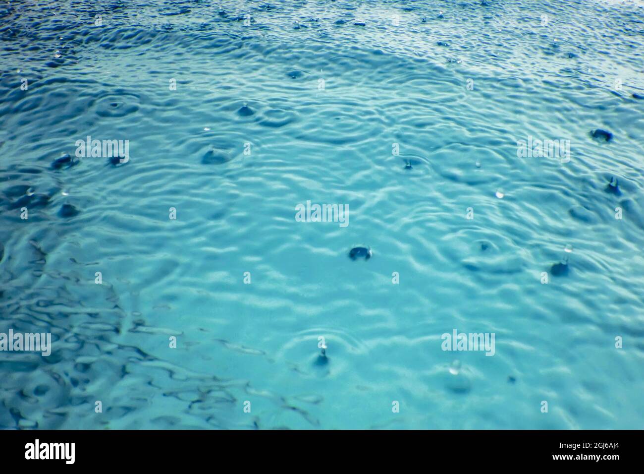 Water Surface with Raindrops, Swimming Pool Rain Stock Photo - Alamy