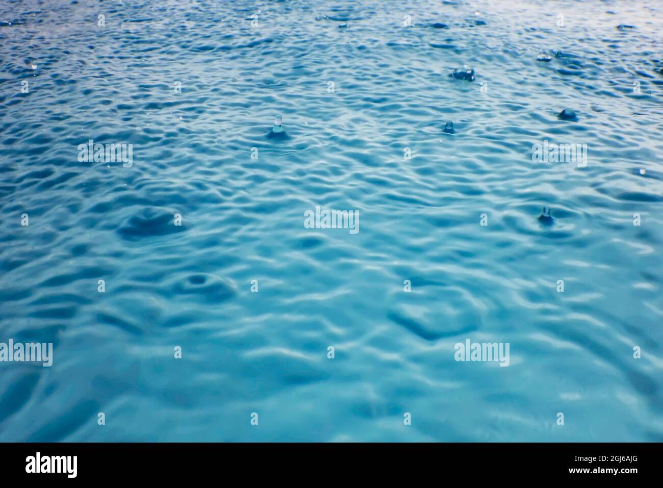 Water Surface with Raindrops, Swimming Pool Rain Stock Photo - Alamy