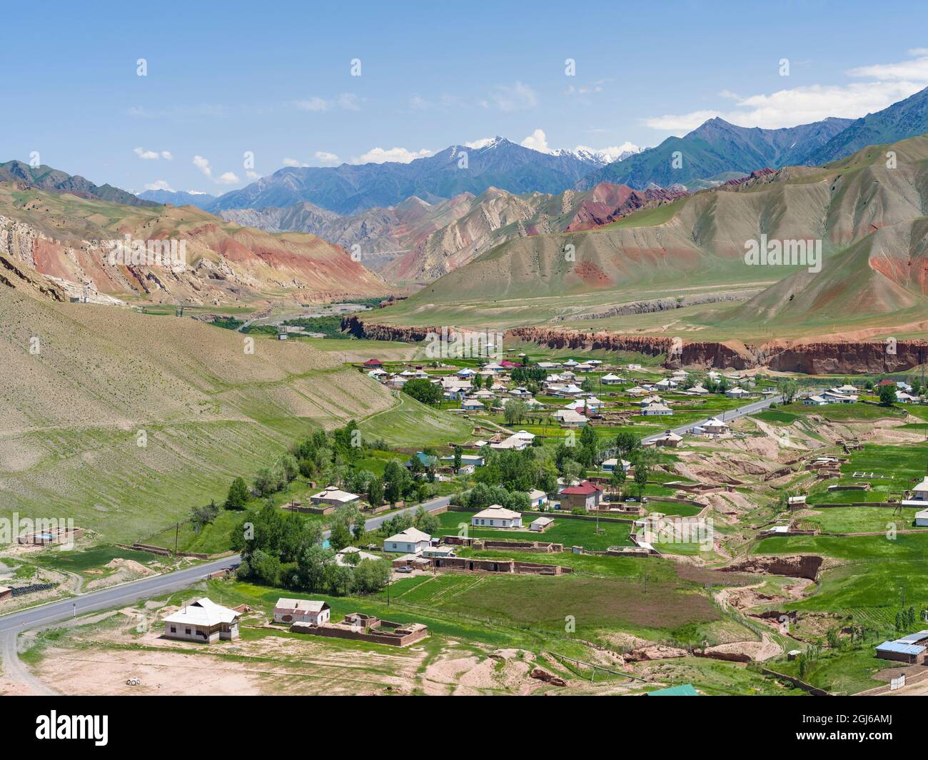 Village at the Pamir Highway. The mountain range Tian Shan or Heavenly ...