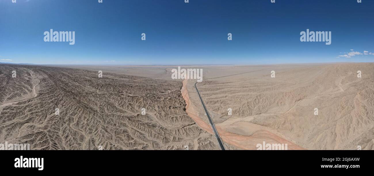 Aerial photo taken on July 18, 2021 shows the red dry riverbed crossing ...