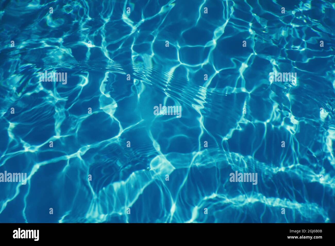 Swimming pool water sun reflection background. Ripple Water Stock Photo ...