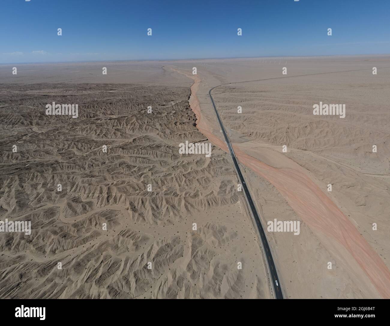 Aerial photo taken on July 18, 2021 shows the red dry riverbed crossing ...