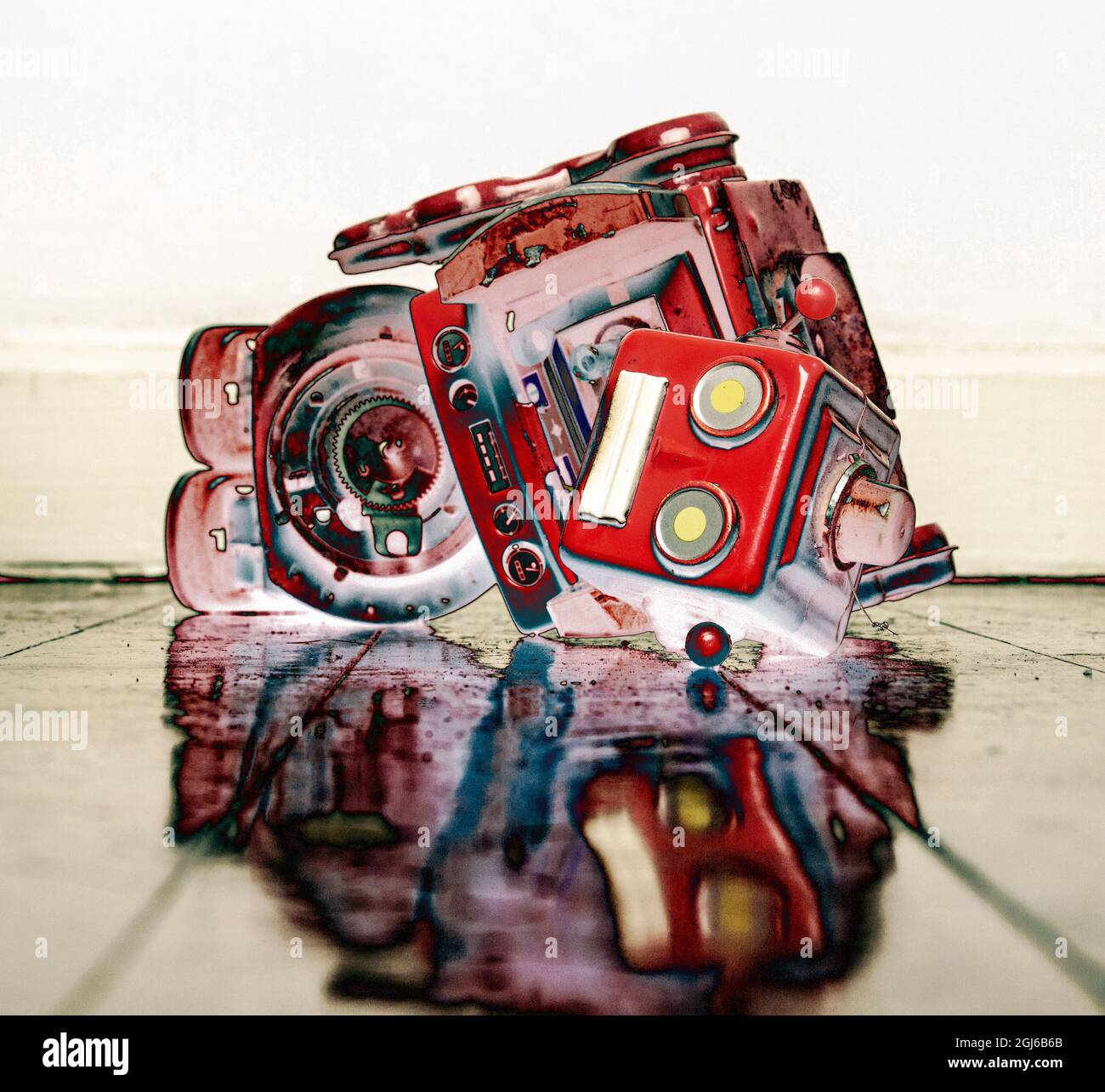 robot wars red robot defeated on old wooden floor Stock Photo - Alamy
