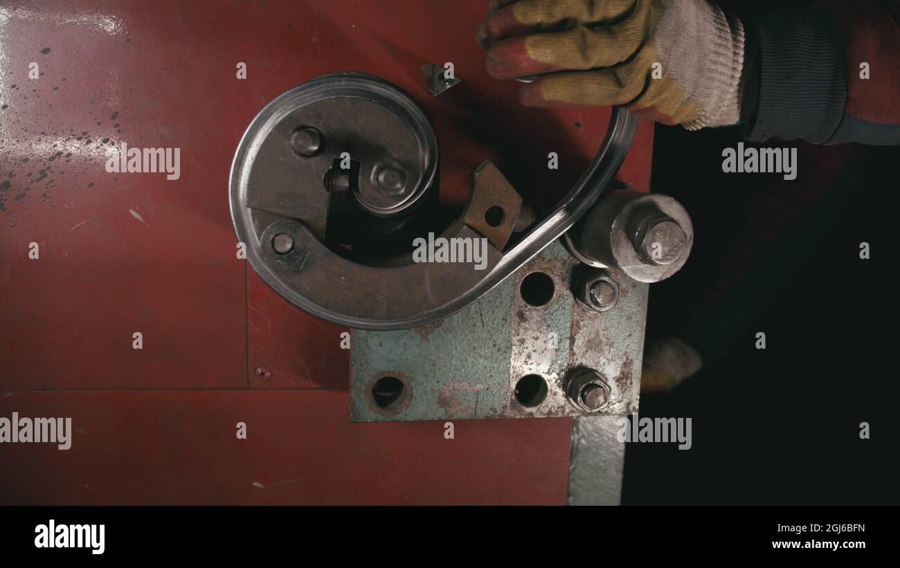 Forge workshop on table. Smithy manual production. Worker bends the ...