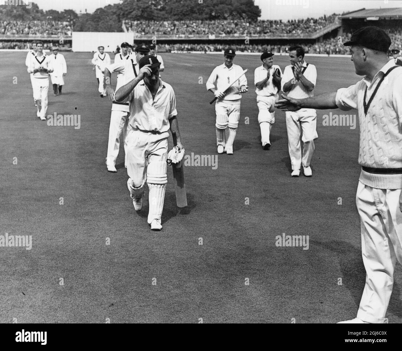 John Hugh Edrich comes in at tea after completing his century in his ...