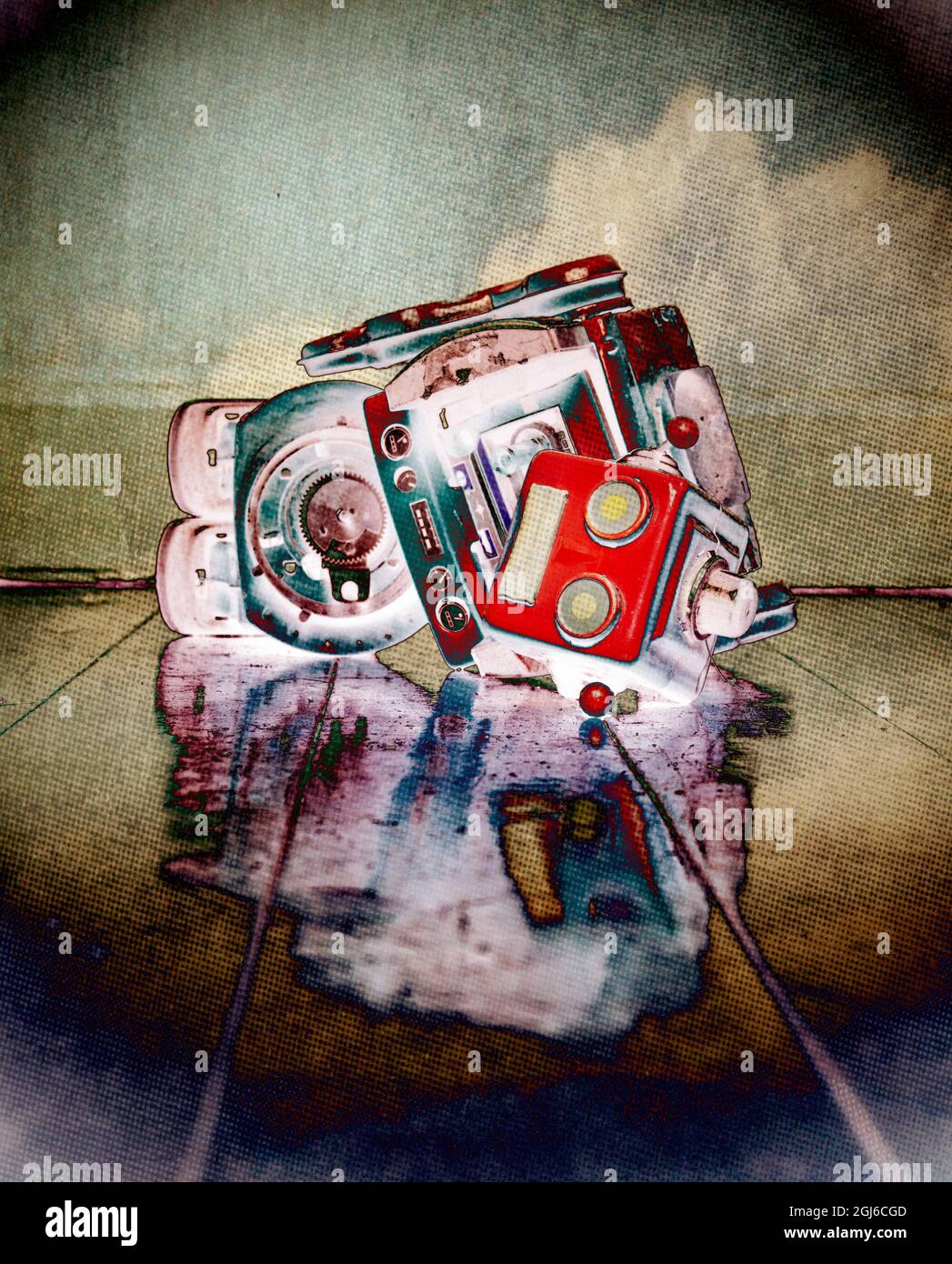 robot wars red robot defeated on old wooden floor Stock Photo - Alamy