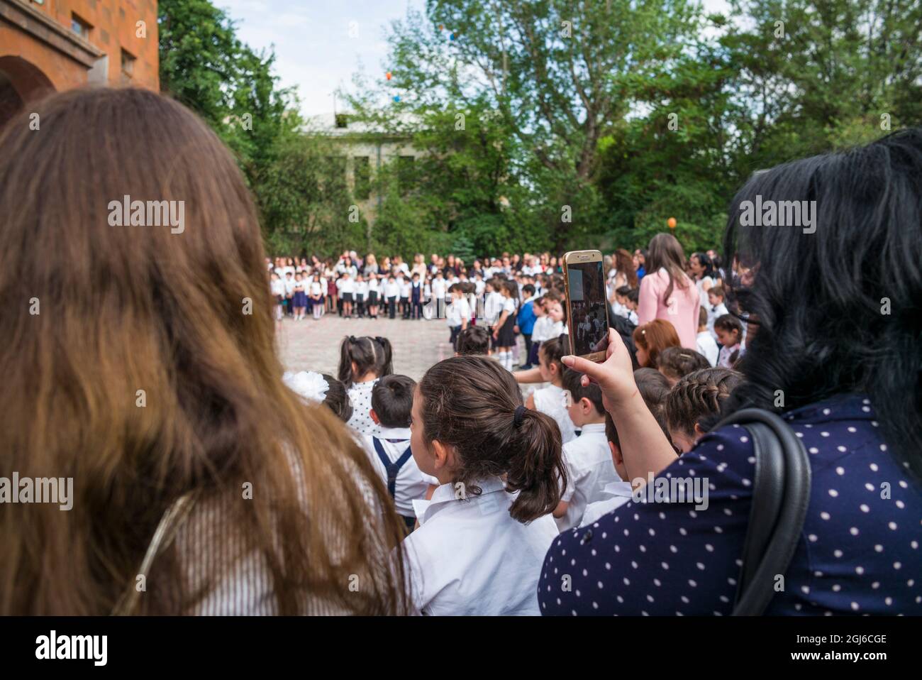 Armenia, Yerevan. Last bell or last day of school ceremonies at public ...