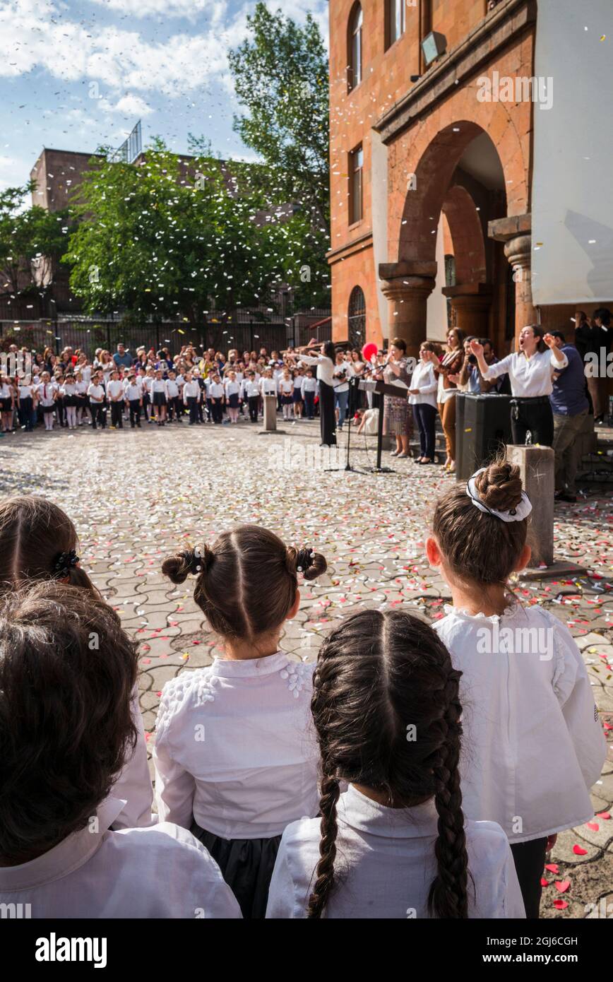 Armenia, Yerevan. Last bell or last day of school ceremonies at public ...