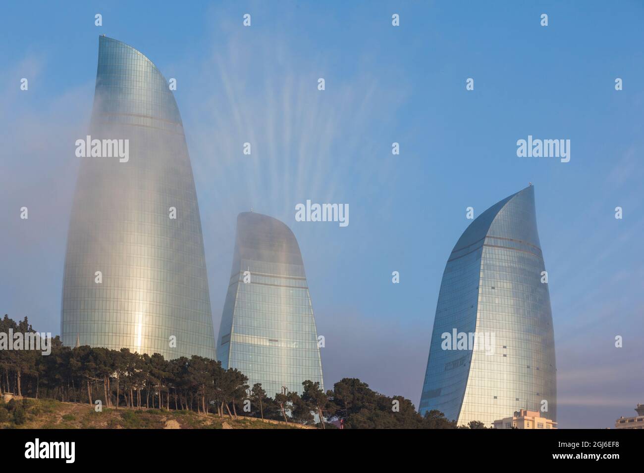 Azerbaijan, Baku. City skyline with Flame Towers from Baku Bay with fog ...