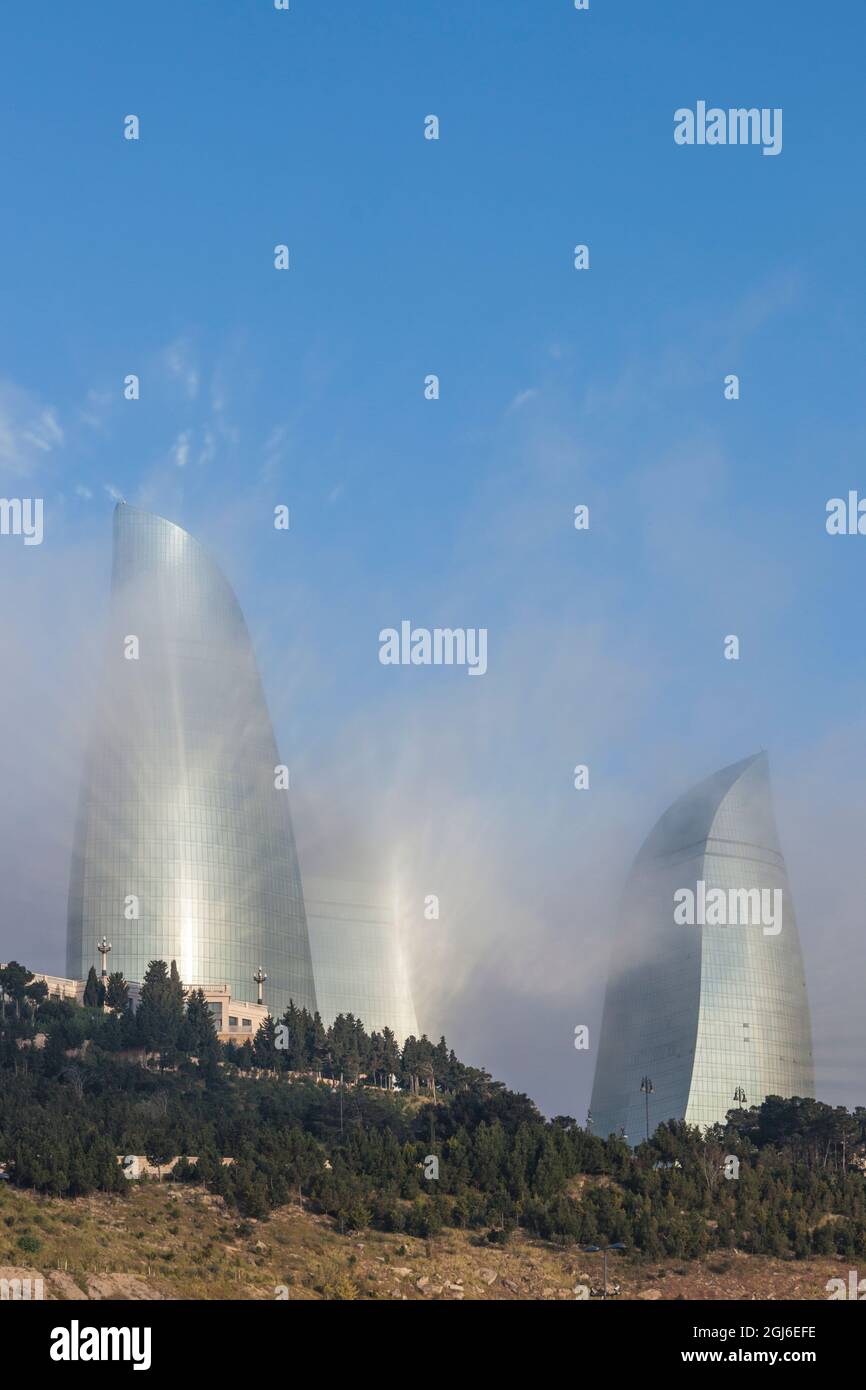 Azerbaijan, Baku. City skyline with Flame Towers from Baku Bay with fog ...
