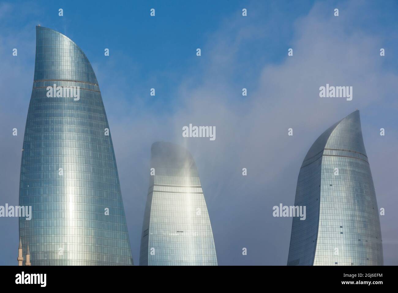 Azerbaijan, Baku. City skyline with Flame Towers from Baku Bay with fog ...