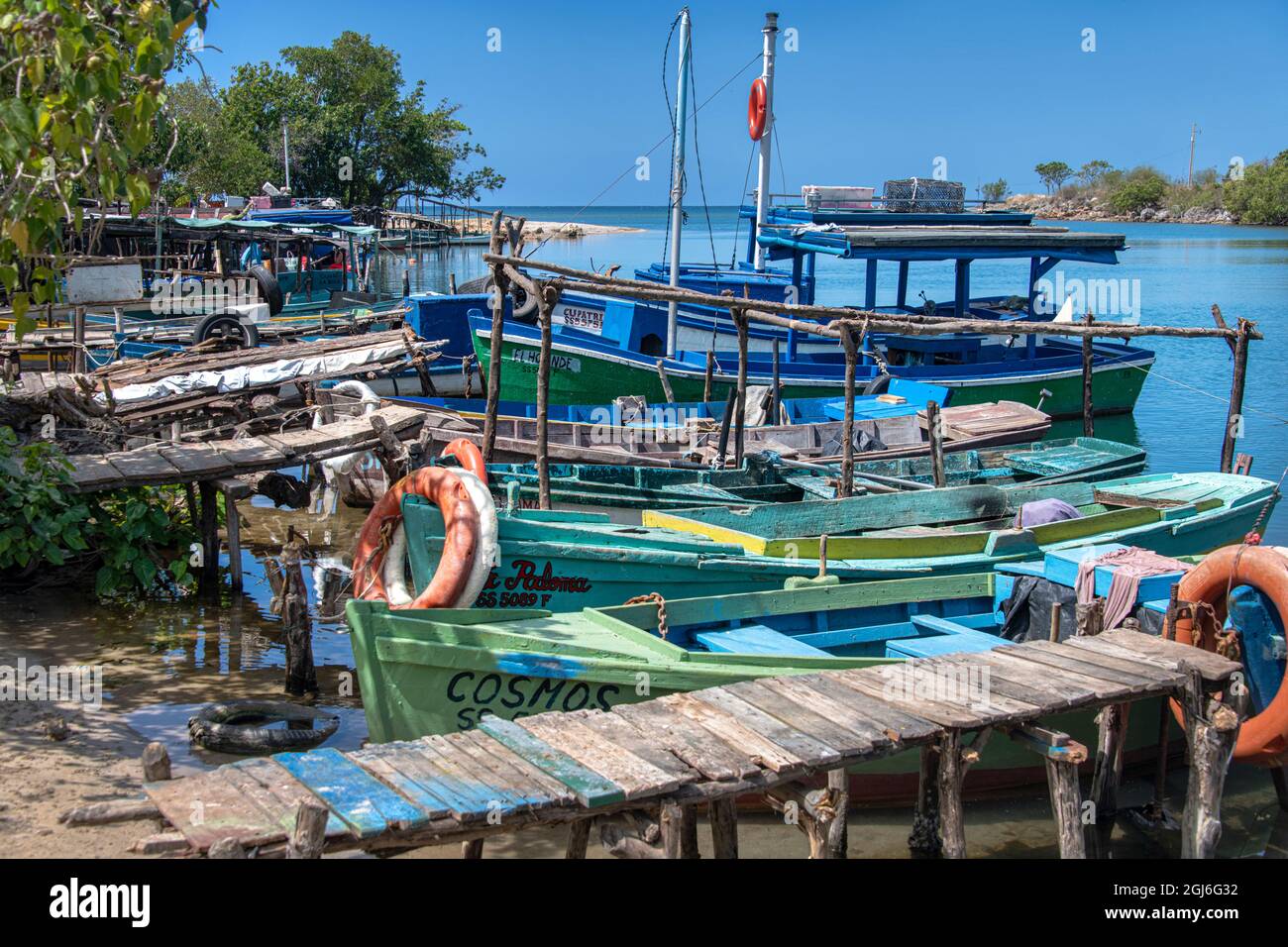 Colorful wooden fishing boats on Rio Guaurabo in LaBoca, Cuba Stock ...