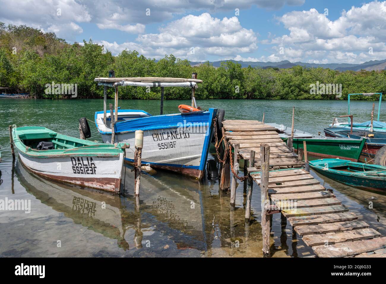 Colorful wooden fishing boats hi-res stock photography and images - Alamy