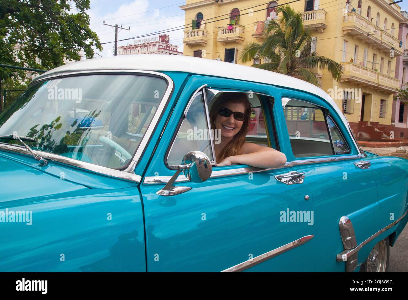 Tourist driving a classic Ford car in Havana, Cuba Stock Photo - Alamy