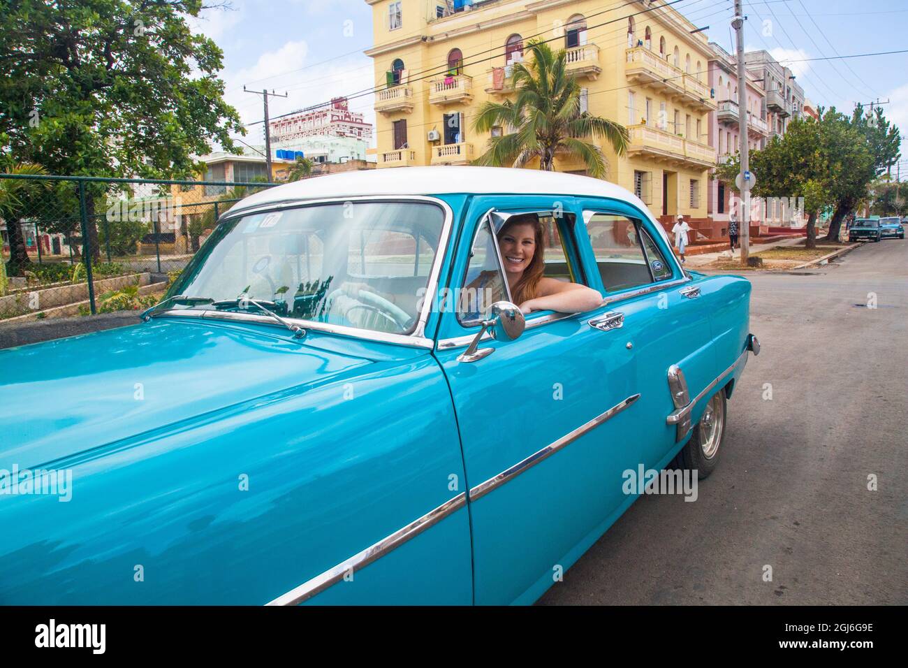 Tourist driving a classic Ford car in Havana, Cuba Stock Photo - Alamy