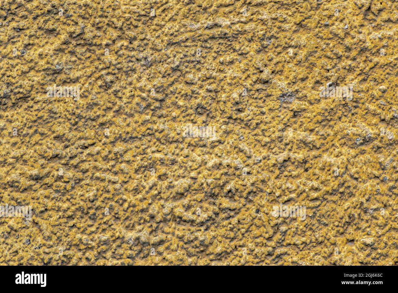 Closeup shot of a textured dirty yellow wall surface Stock Photo - Alamy