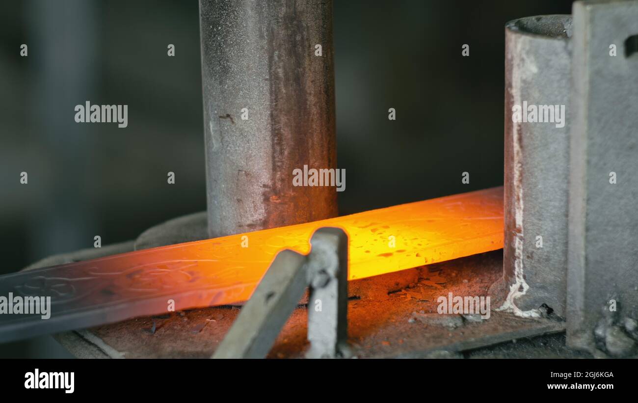 Forge workshop on table. Smithy manual production. Work on the product ...