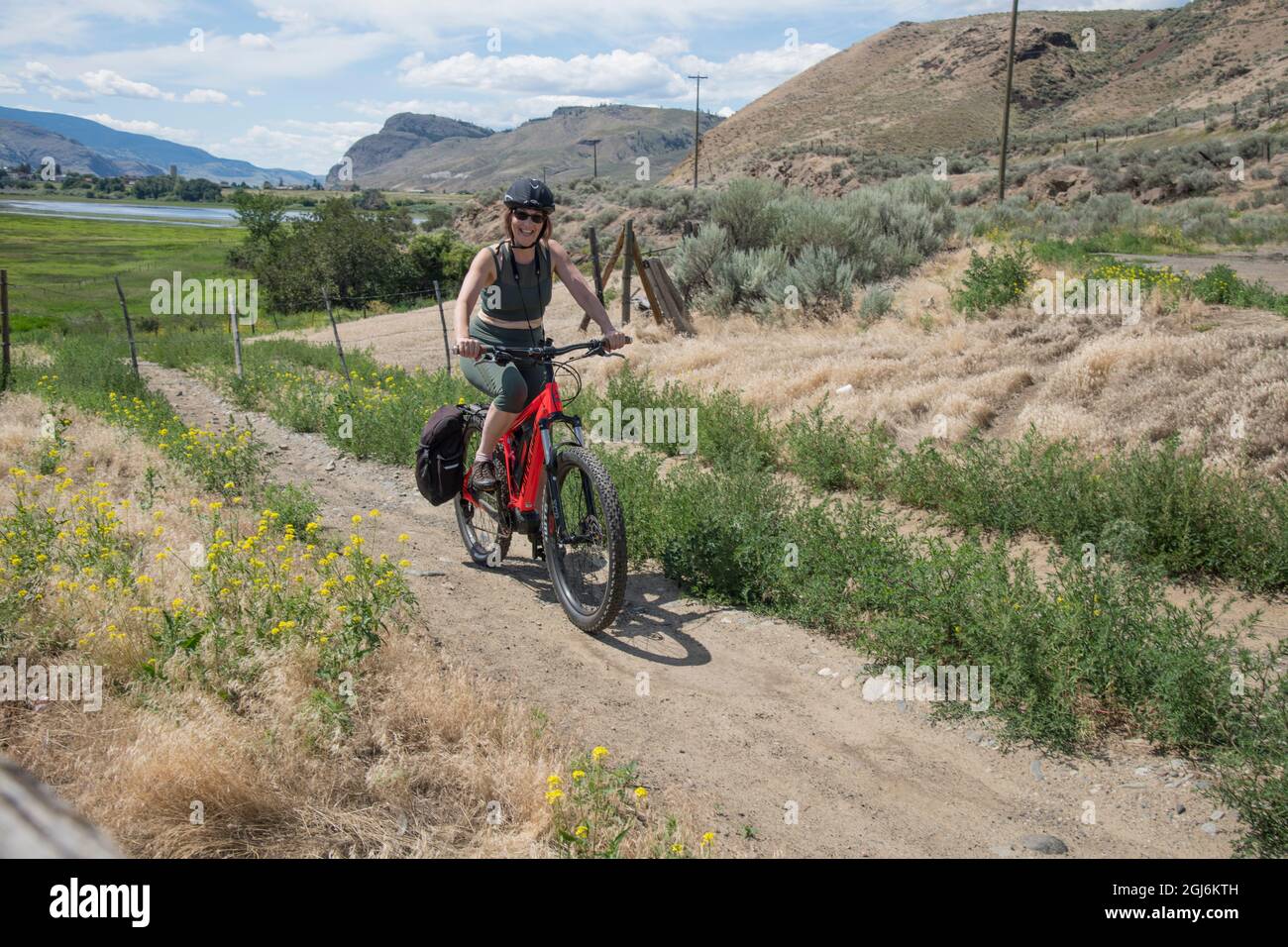 Mountain biking on e-bike in desert landscape Stock Photo - Alamy
