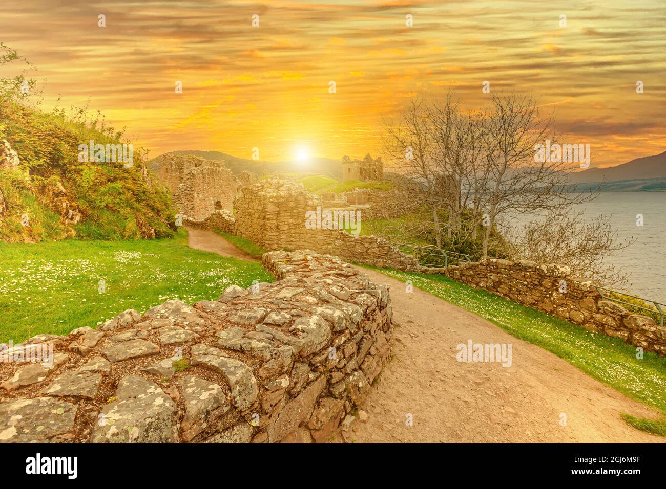 Urquhart Castle at sunset beside Loch Ness in Scotland, United Kingdom ...