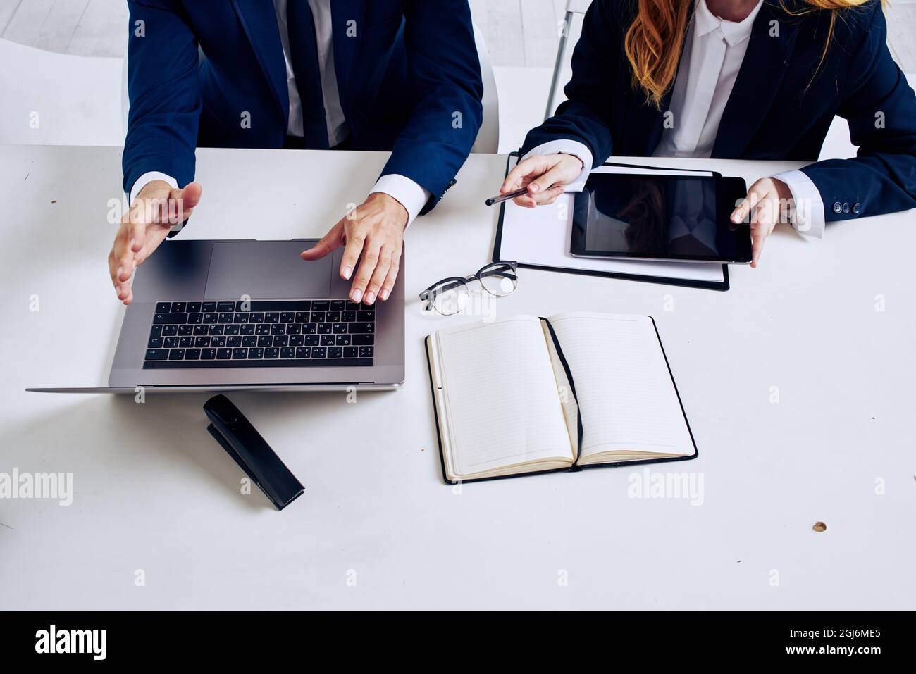 managers laptop and documents on the table officials Stock Photo - Alamy
