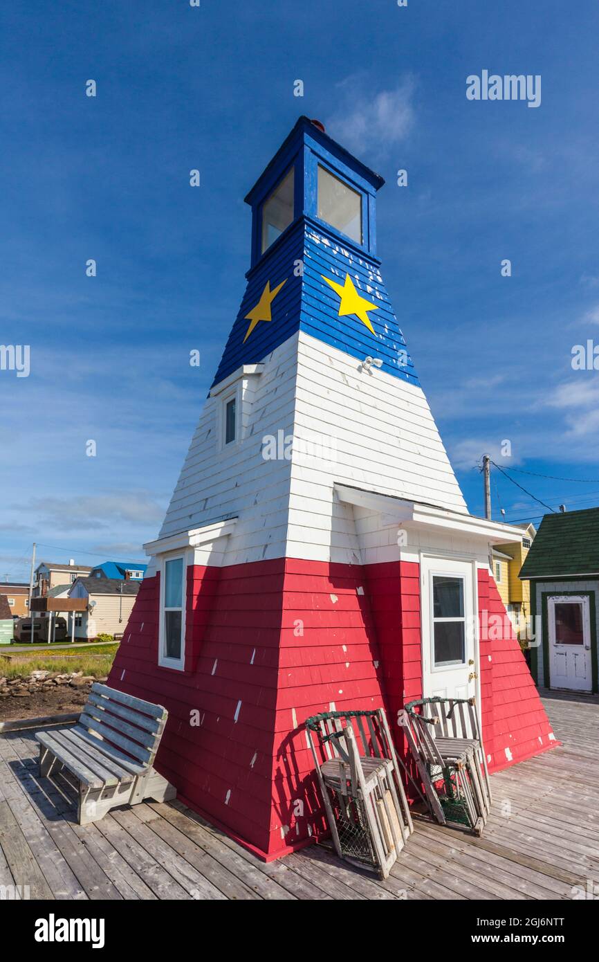 Canada, Nova Scotia, Cabot Trail. Cheticamp, town lighthouse painted in ...