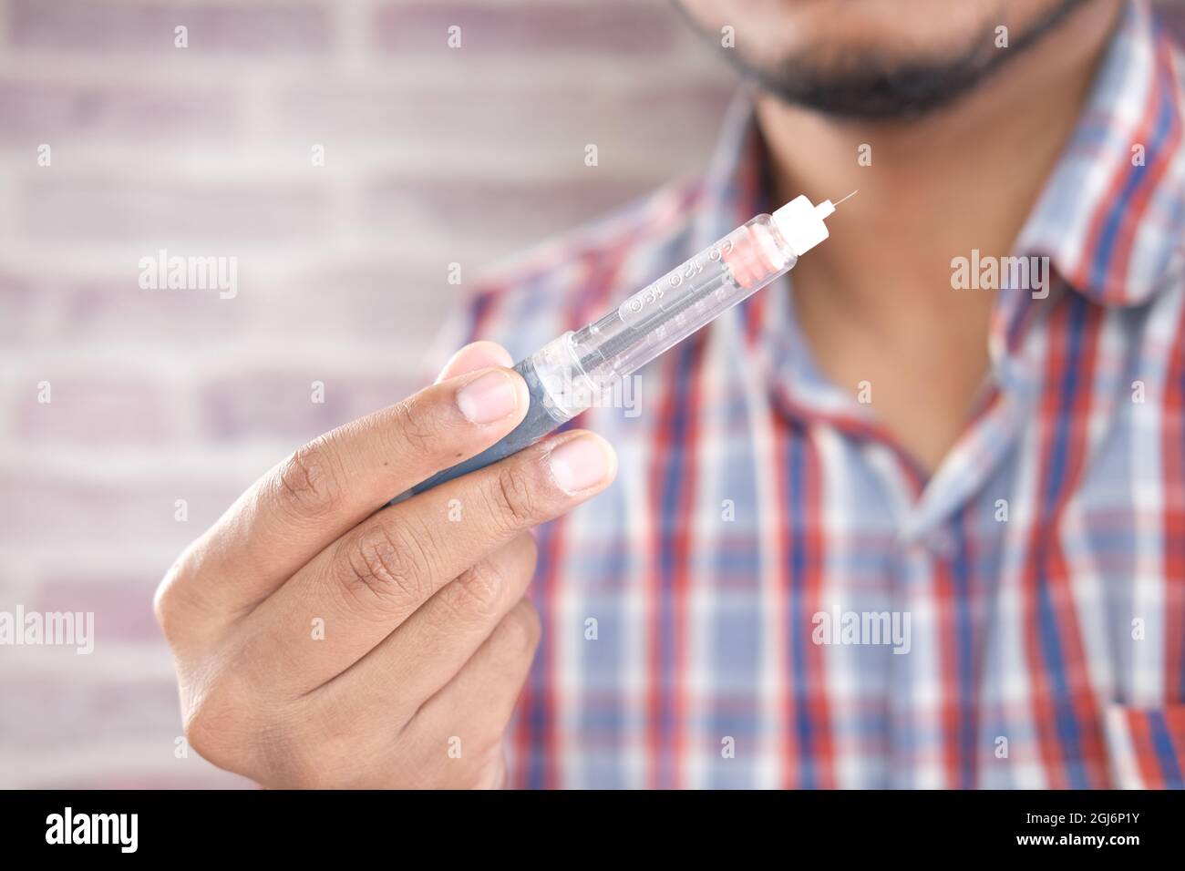 hand holding Insulin pens with copy space, Top down Stock Photo - Alamy