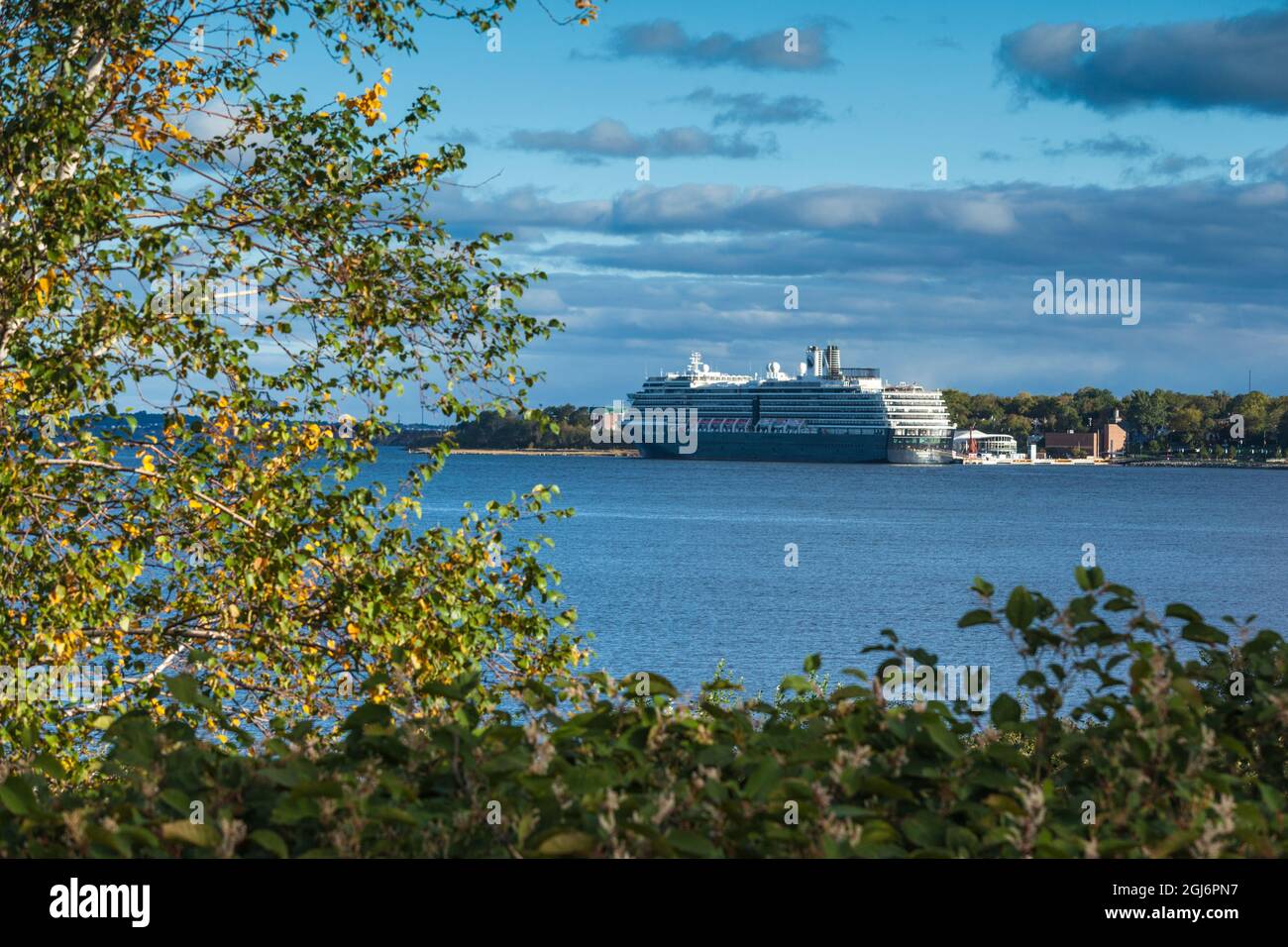 Canada, Nova Scotia, Sydney, city skyline with cruise ship, morning ...
