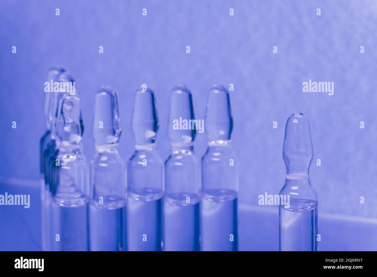 Glass medical ampoule vial for injection. Medicine is liquid sodium ...