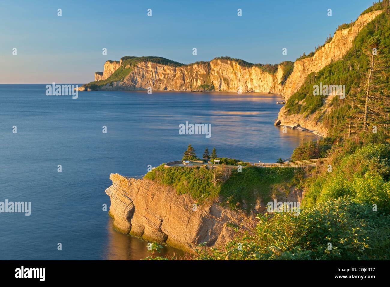 Canada, Quebec, Forillon National Park. Limestone cliffs along bay ...