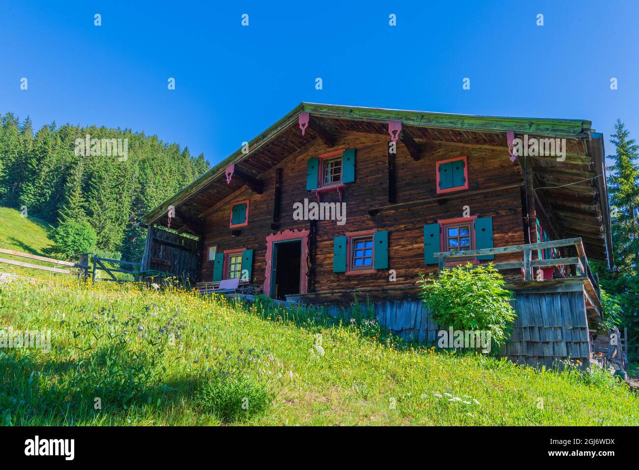Rustic colorful cabin in the Austrian Alps in Spring Stock Photo - Alamy