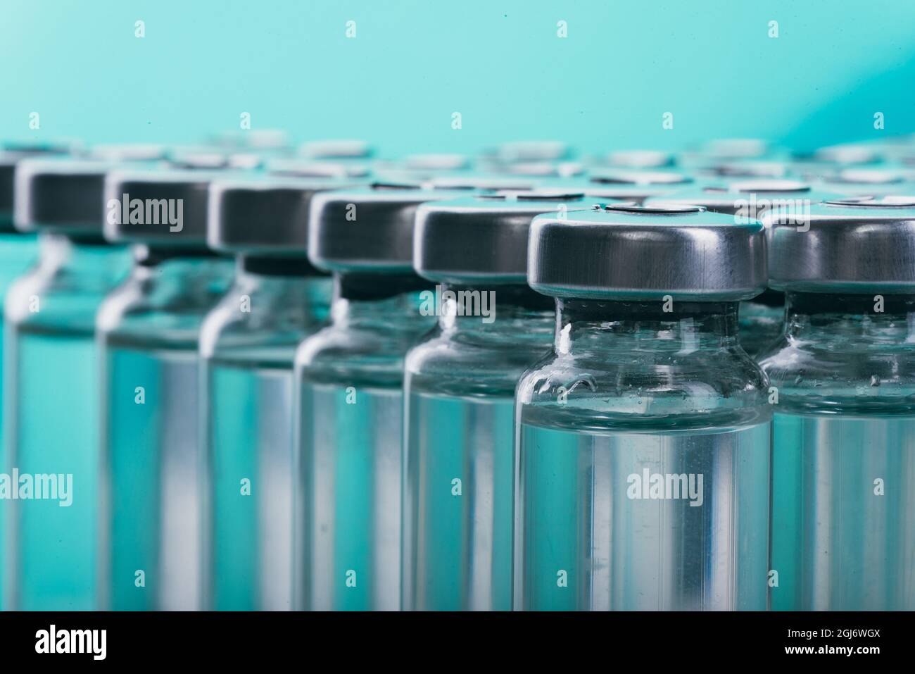 Glass medical ampoule vial for injection. Medicine is liquid sodium ...