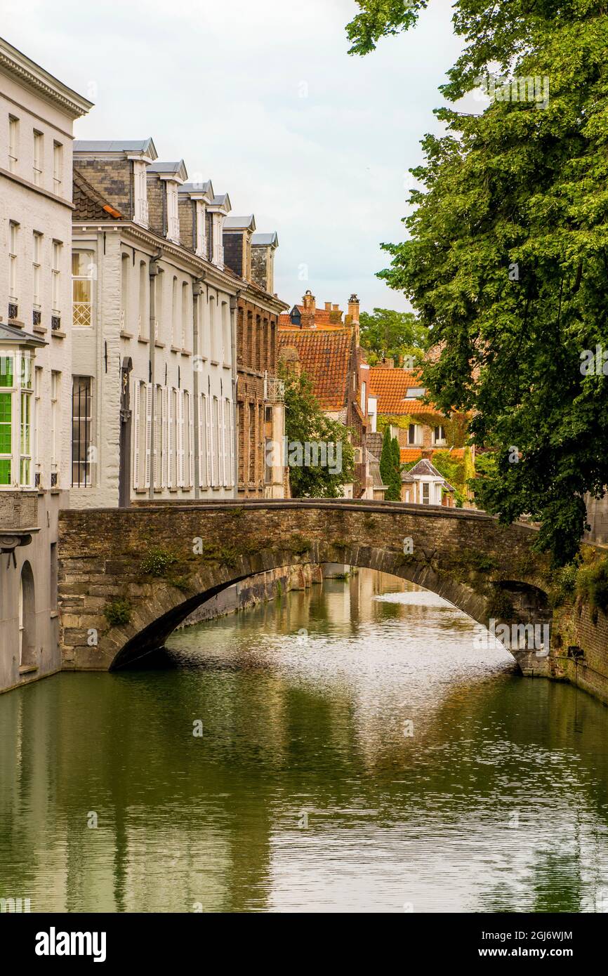 Medieval stone bridge on canal, on canal, Bruges, West Flanders ...
