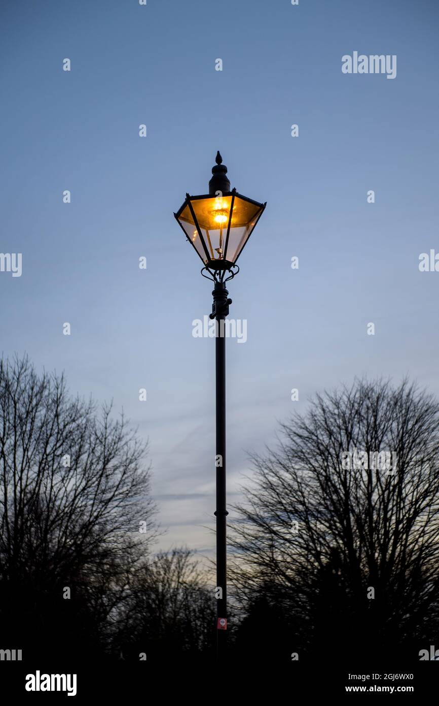 Vintage lamp pole in London park with clear blue sky Stock Photo - Alamy