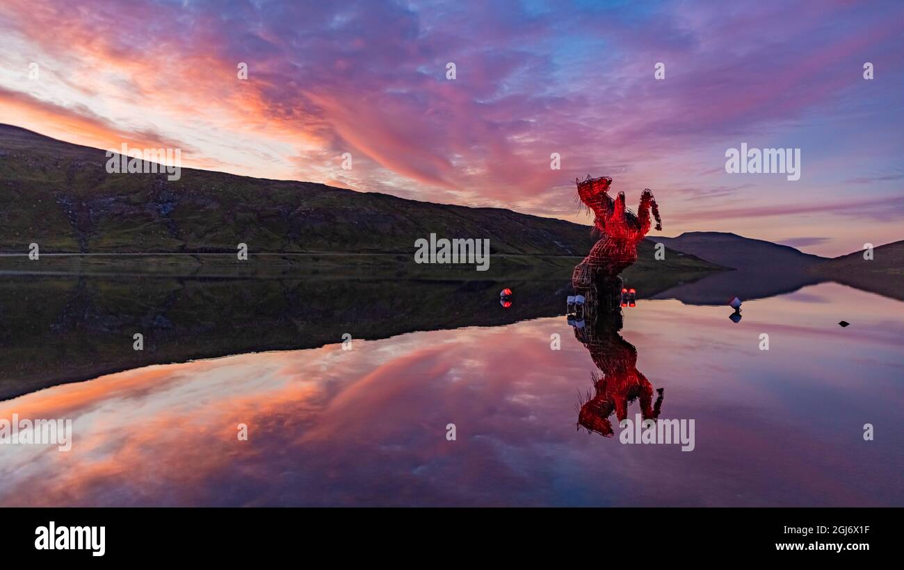 Europe, Faroe Islands. View of the Nix, a statue of the Nix, a mythic ...