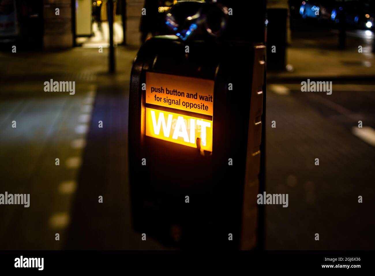 Push button and wait for signal opposite, Wait - defocused background ...