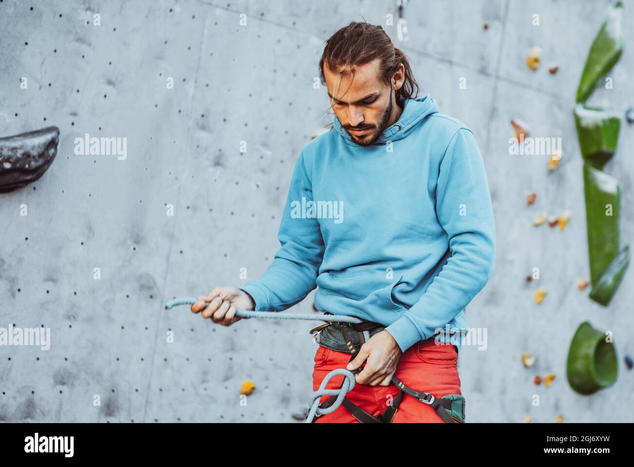 Young sports man holding high hi-res stock photography and images - Alamy