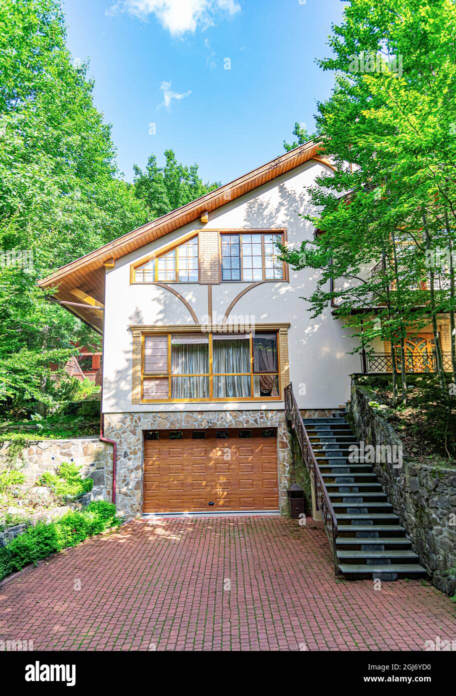 Stone house among trees hi-res stock photography and images - Alamy