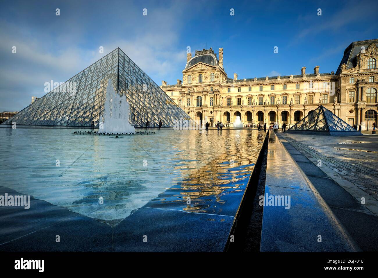 Pyramid and courtyard to the Louvre in Paris, France Stock Photo - Alamy