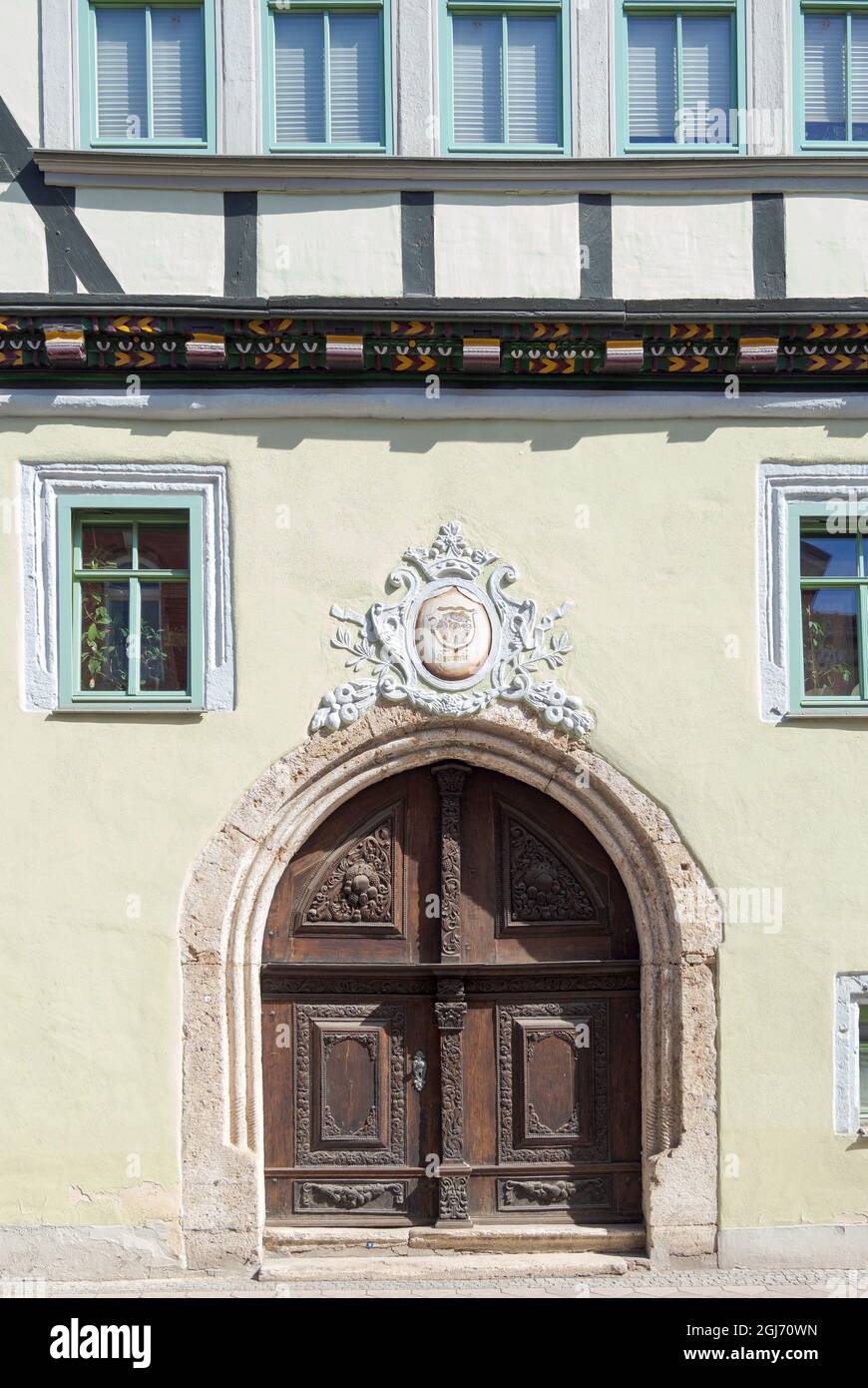 Entrance to an old town house. The medieval town Muehlhausen in ...