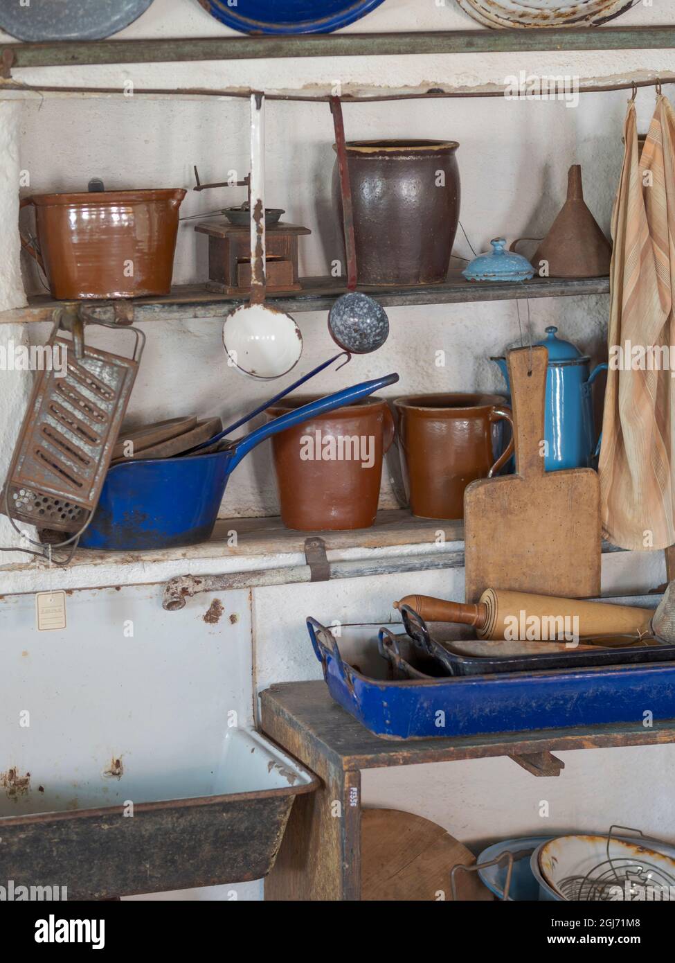 Kitchen with utensils. Interior of a historic farmhouse. Open Air ...