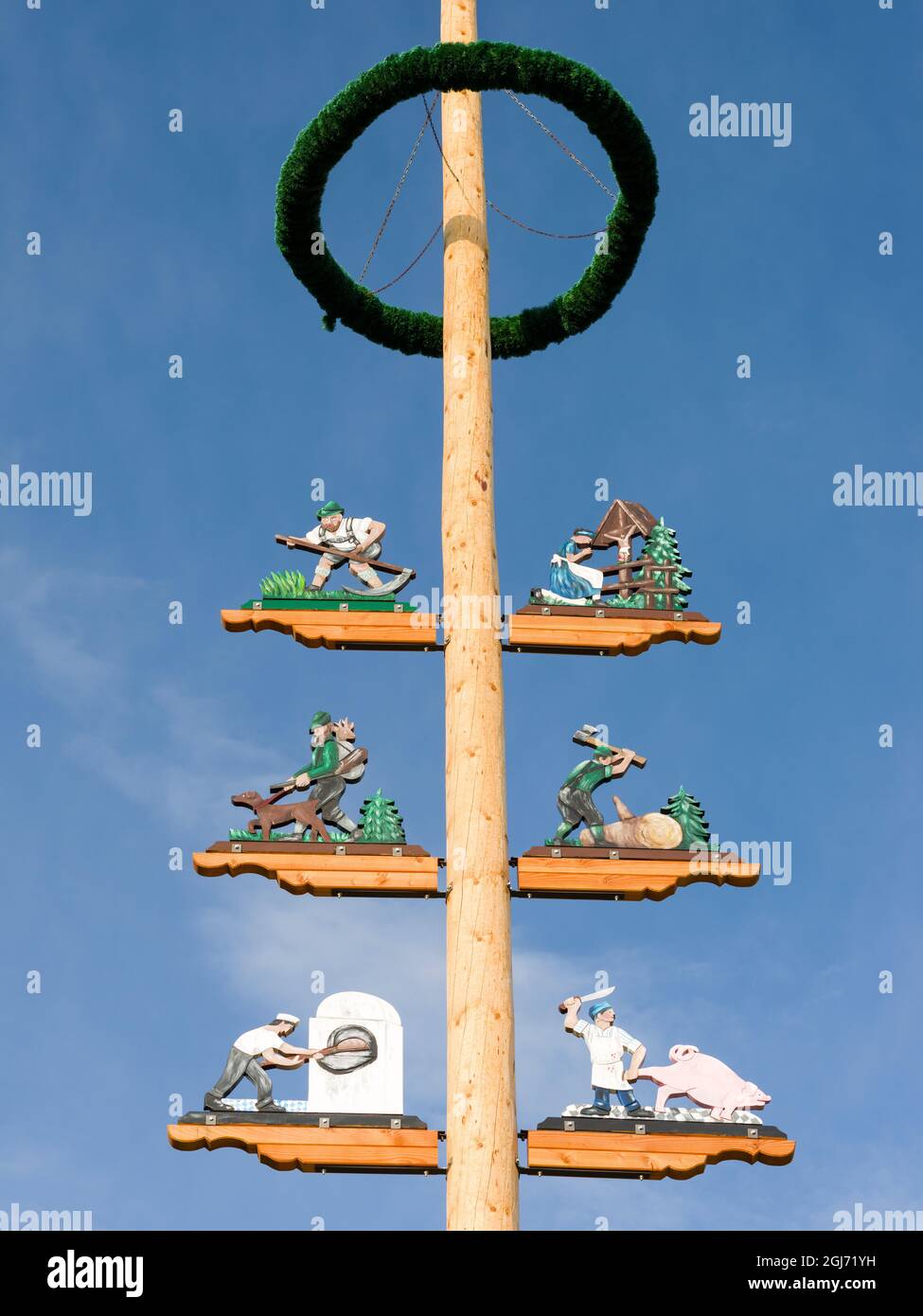 Traditional Bavarian maypole (Maibaum). Village Sachrang in the ...