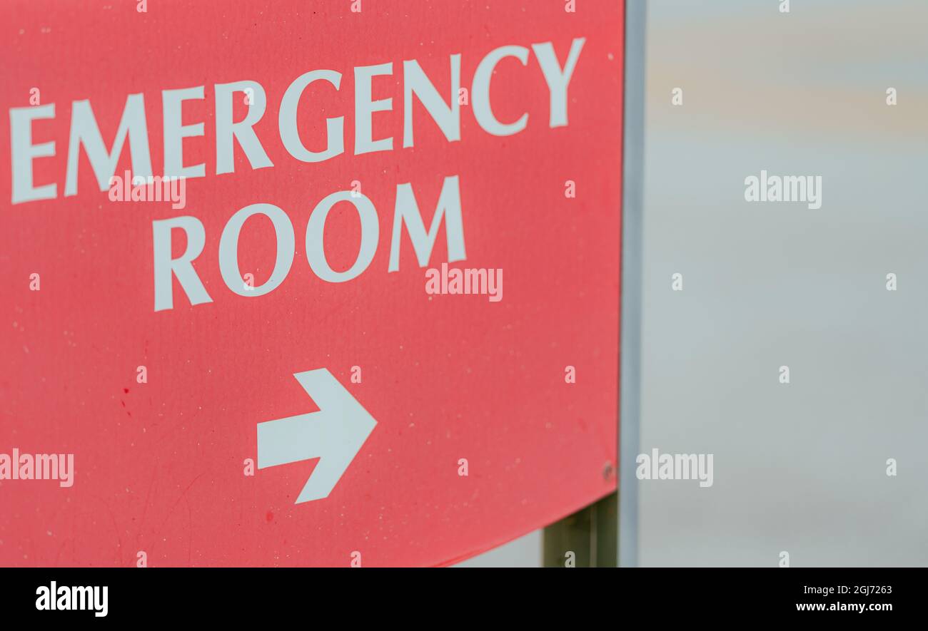 Red EMERGENCY ROOM sign in a hospital Stock Photo - Alamy