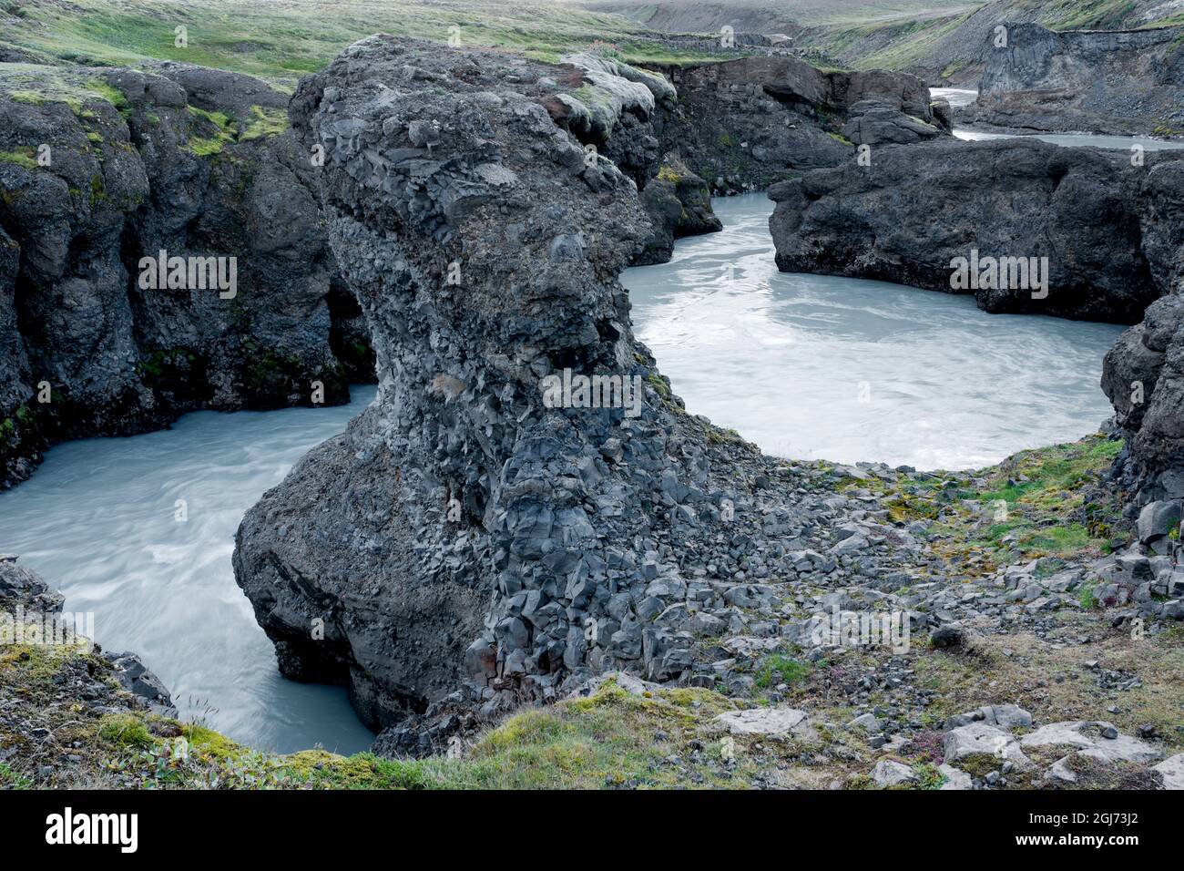 Iceland, Jokulfall River snakes through black lava Stock Photo - Alamy