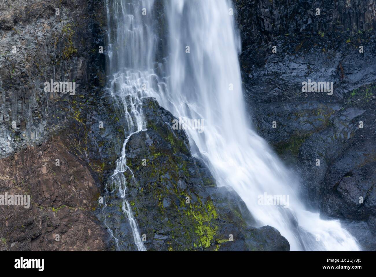 Iceland, Glanni Waterfall. The Fossa River flows over the cliffs ...